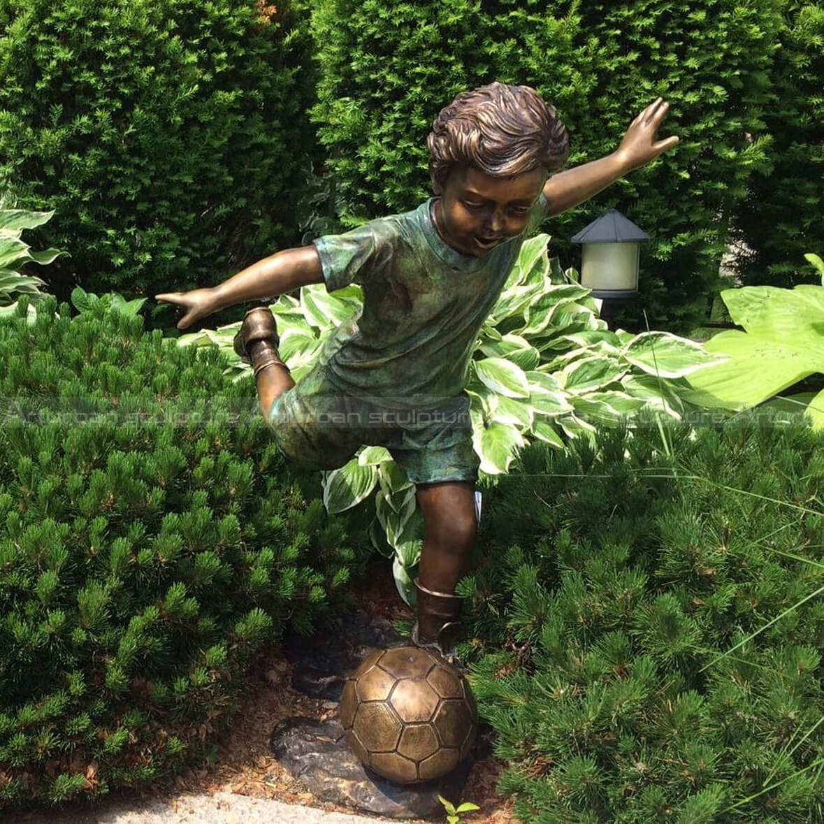 Boy With Football Statue
