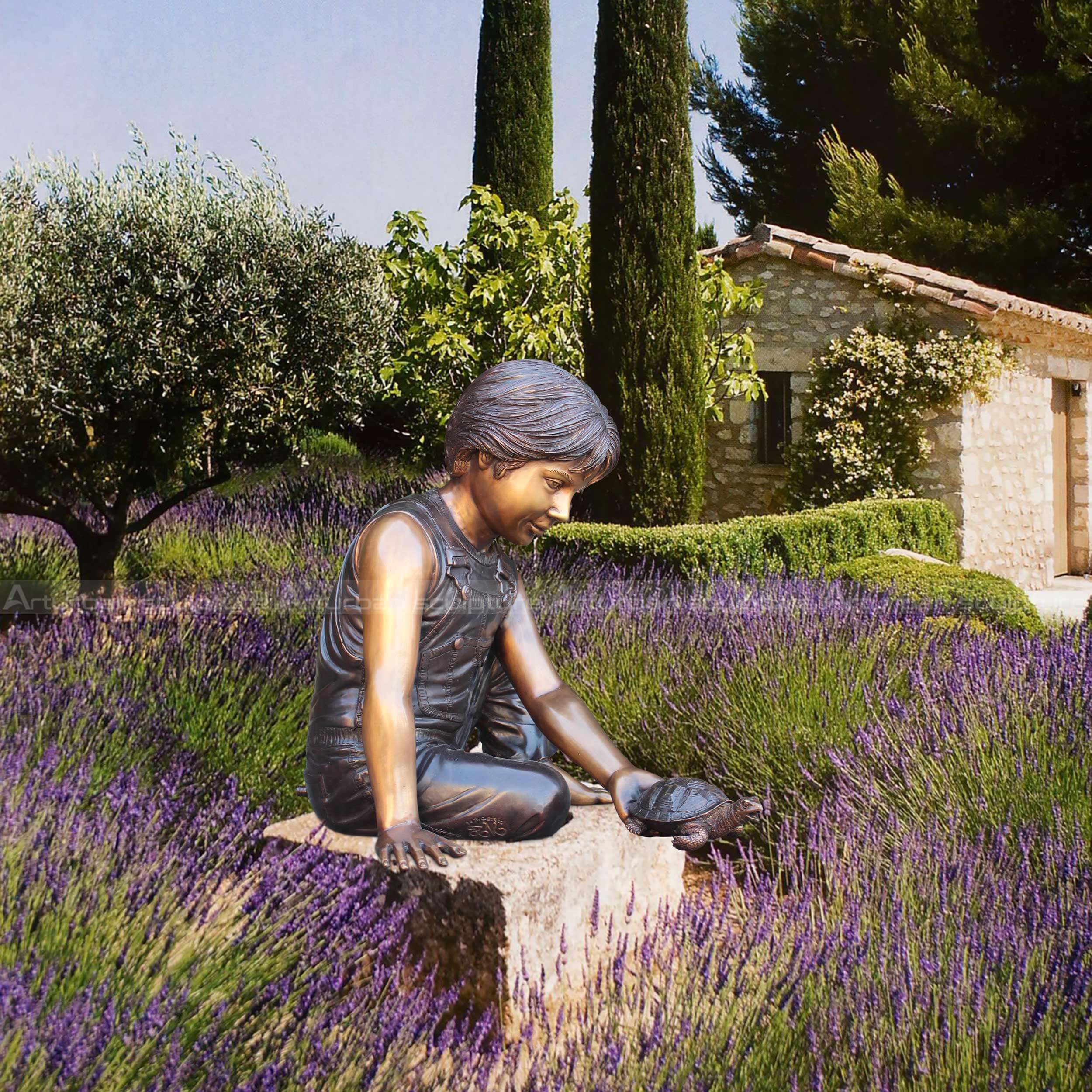 Boy With Turtle Statue