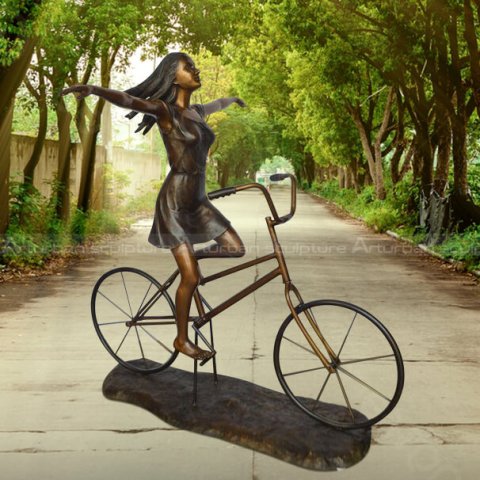 Girl on Bicycle Statue