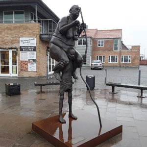 Survival of The Fattest Statue