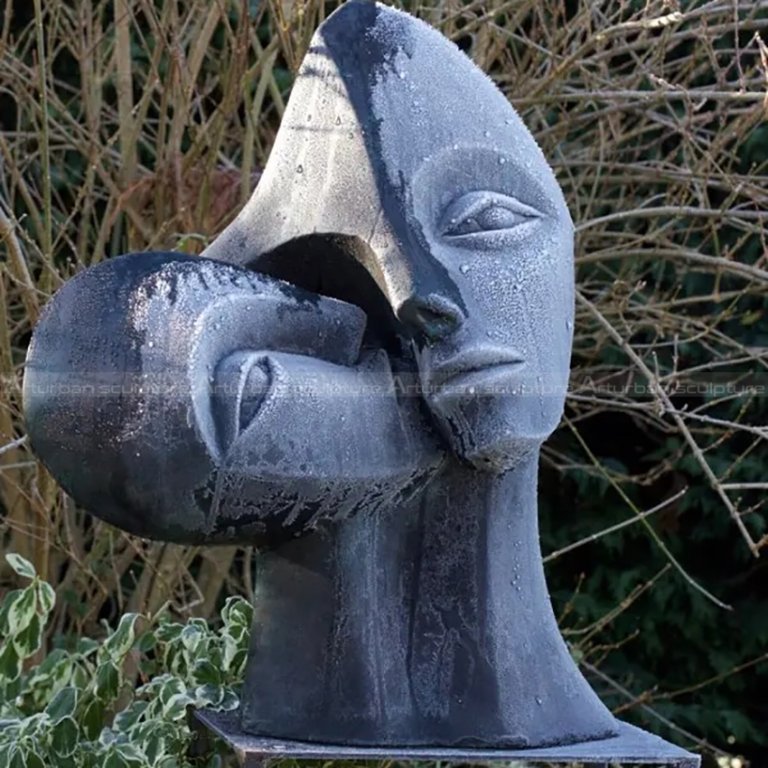 Two Face Sculpture