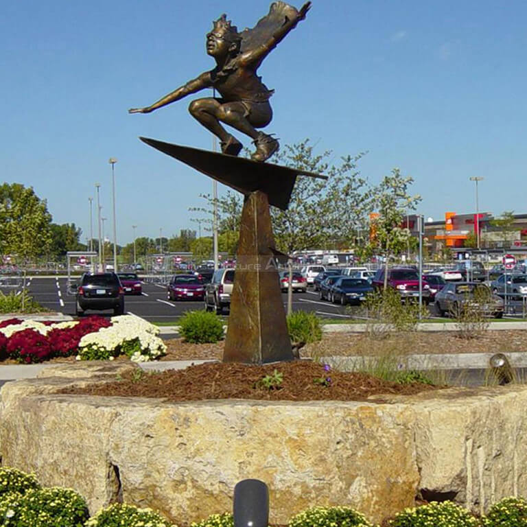 Boy Flying on Paper Airplane Statue
