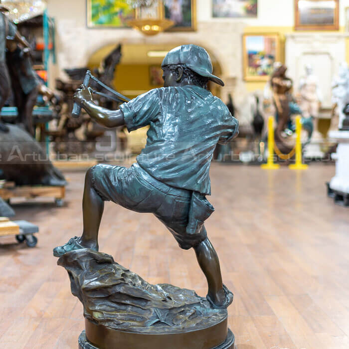 boy with slingshot sculpture - Arturban Statue